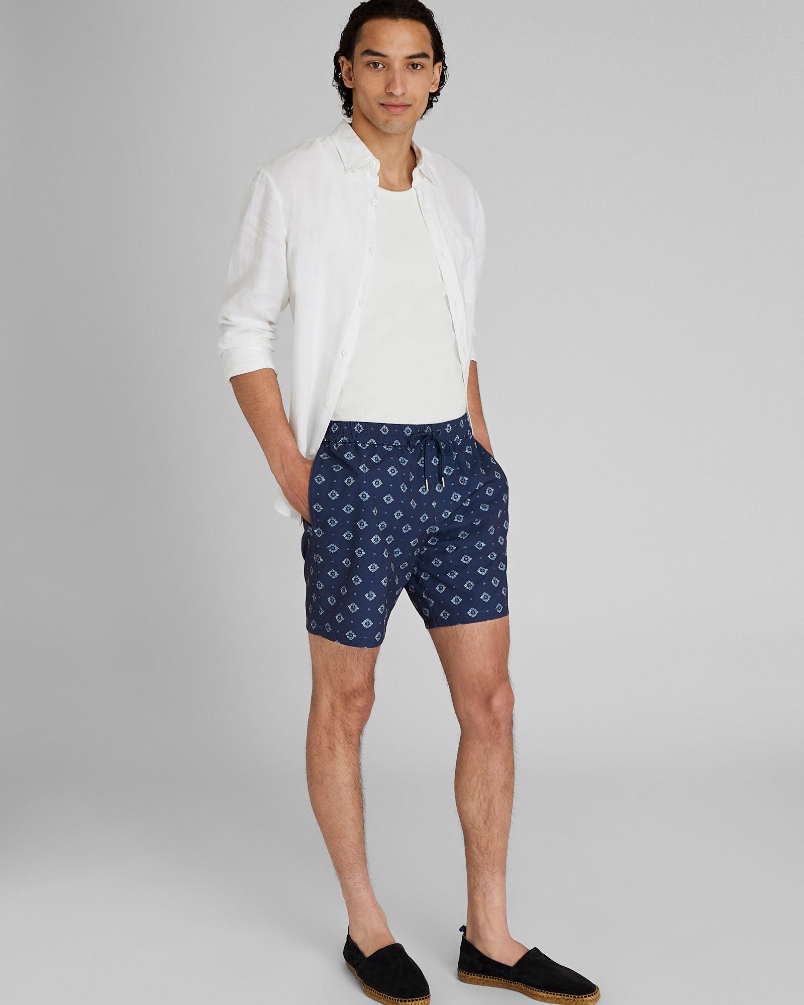 Men's Navy Base Bo Swim Medallion-Print 7" Swim Trunk | Club Monaco US